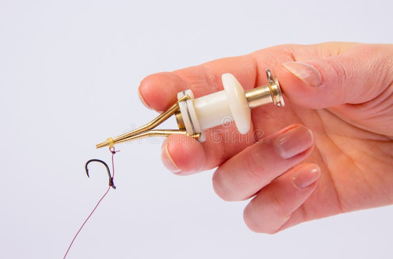 Fishing Device for Putting on the Bait. New in the Method Feeder. Stock ...