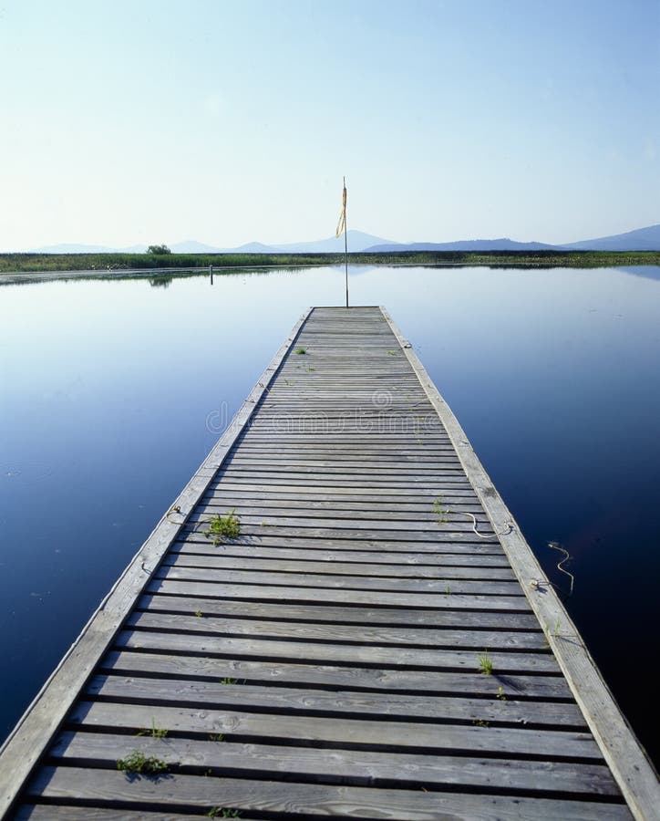 Fishing dock stock photo. Image of mountains, mooring - 23175802