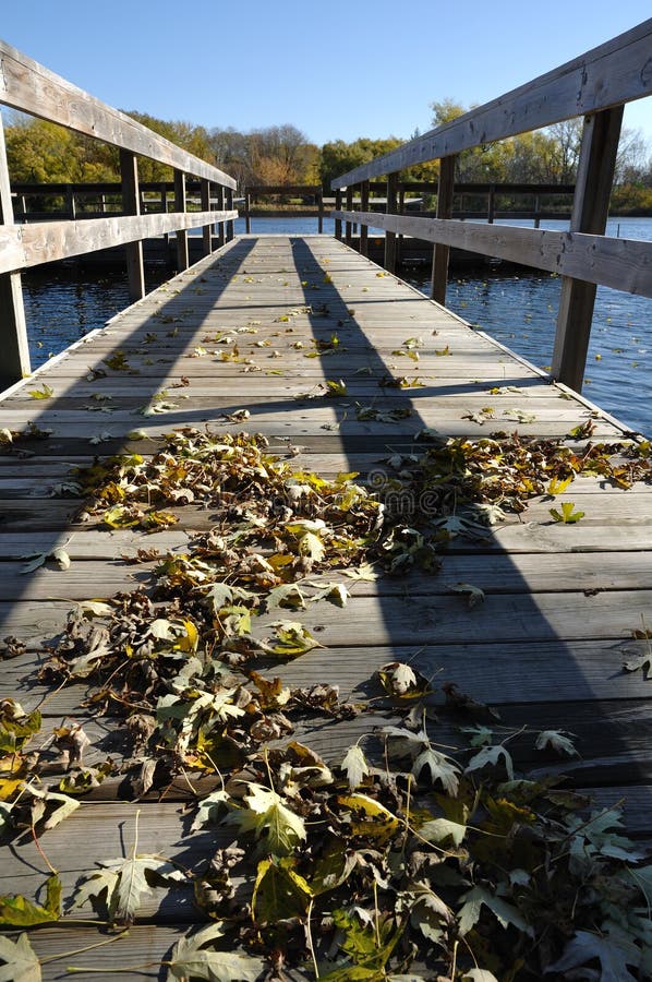Fishing Dock in the Autumn stock photo. Image of leaves - 14307922