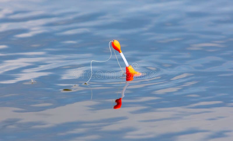 A Fishing Float Floats on the Waves Stock Image - Image of waves, beach ...