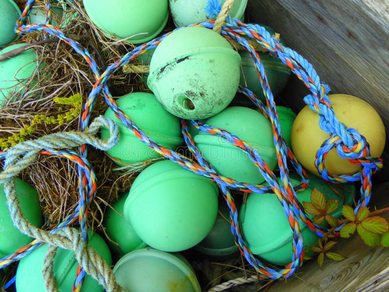 Green Plastic Fishing Floats Stock Photo - Image of spheres, fishing ...