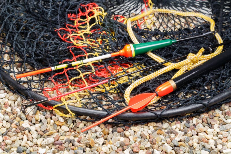 Set of Fishing Floats in the Storage Box and Fish Tank on the Stony ...