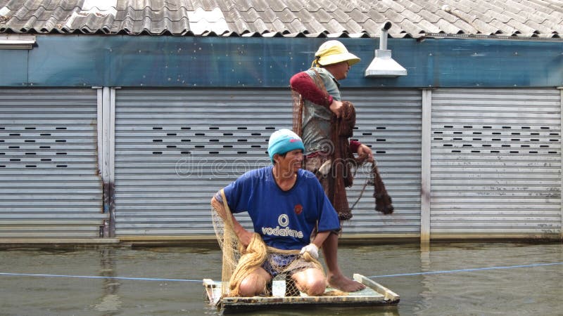 Fishing in the Flood Waters 2 Editorial Stock Photo - Image of ...