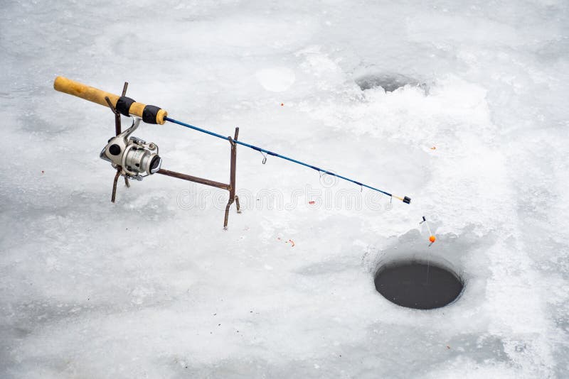 Fishing on a Frozen Lake in Winter Stock Photo - Image of peaceful ...