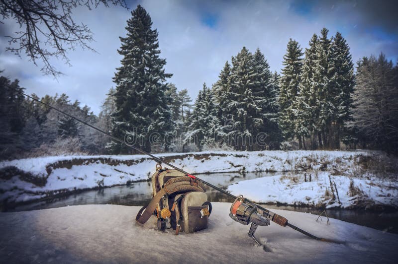 Fishing Gear on a Winter, Snow-covered River Stock Photo - Image of ...
