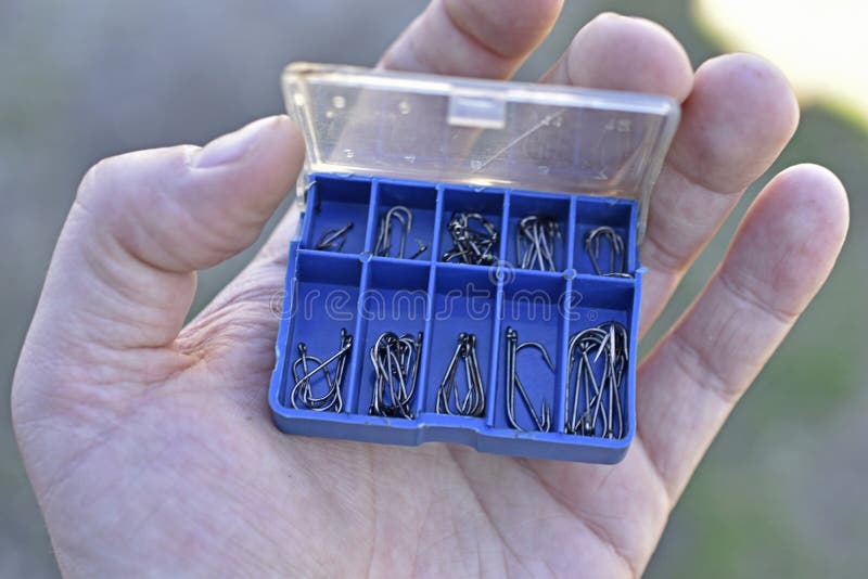 Fishing Hooks in a Box in Your Hand Stock Image - Image of hook, fish ...