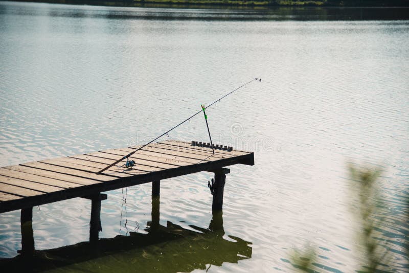 Fishing on the Lake at Sunset. Fishing Background Stock Image - Image ...