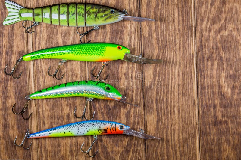 Fishing Lures on Wooden Background Stock Photo - Image of fishing, bait ...