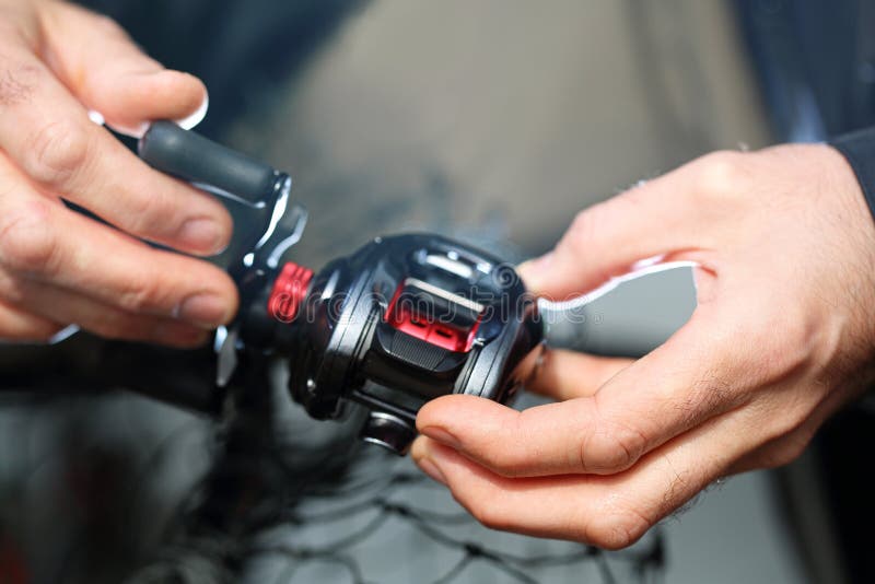 Fishing. stock image. Image of hands, male, holds, reel - 92646563