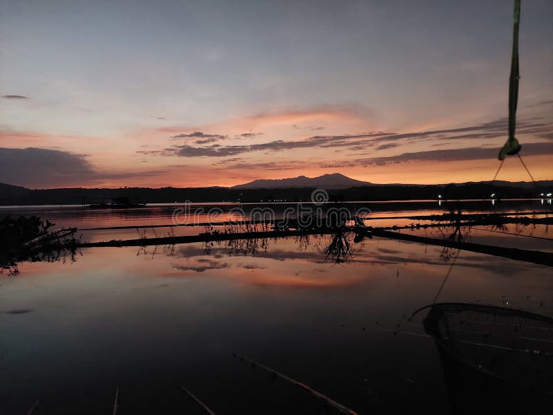 Fishing the Morning Sunrise Stock Photo - Image of sunrise, fisher ...
