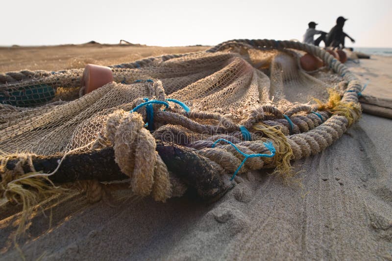Fishing net on the beach stock photo. Image of pattern - 13120182