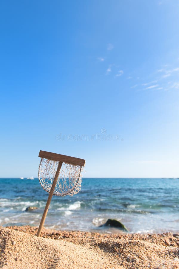 Fishing net at the beach stock image. Image of sand - 116041219
