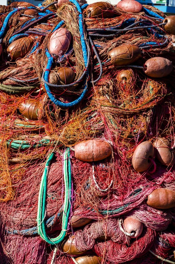 Fishing net with the beach stock photo. Image of fish - 94007840