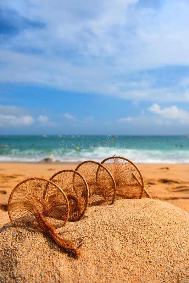 Fishing net at the beach stock image. Image of fishing - 321847543
