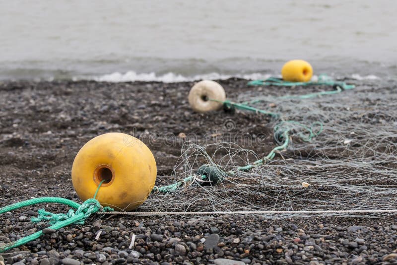 Fishing Net on a Black Shore Stock Photo - Image of fishnet, failure ...