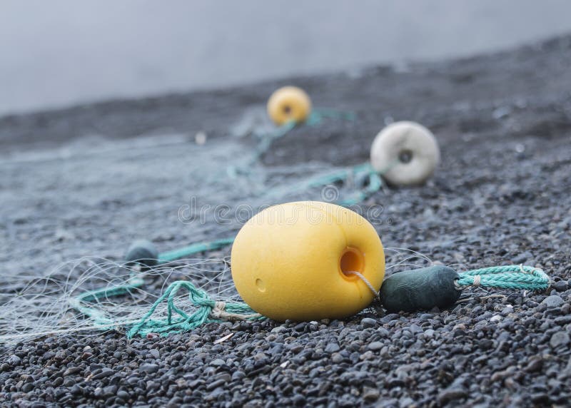 Fishing Net on a Black Shore Stock Image - Image of beach, surf: 79899853