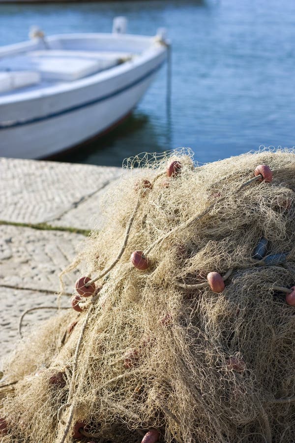 Fishing net and boat stock photo. Image of fish, coast - 16215480