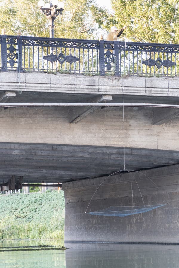 Fishing with a Net from the Bridge Stock Image - Image of leisure ...