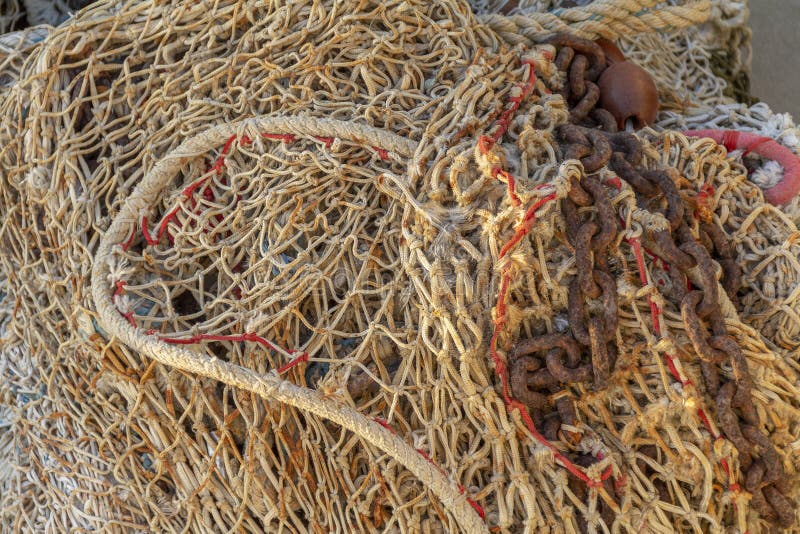 Fishing net entanglement stock image. Image of full - 141552969