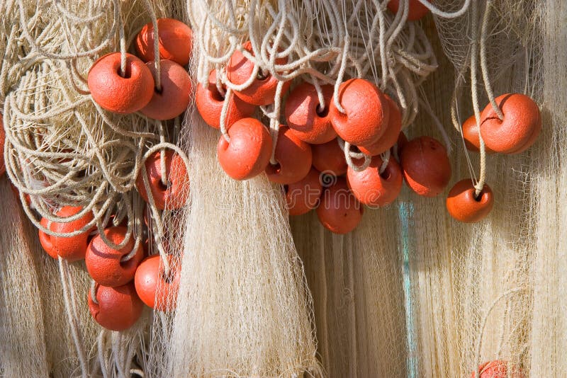 Fishing net with floats stock photo. Image of rope, detail - 79809036