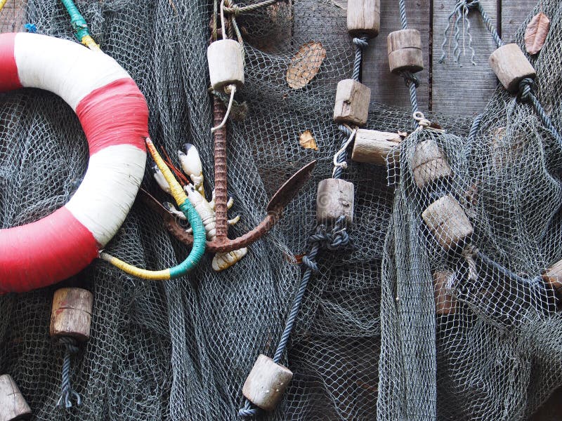Fishing Net is Hanging on the Wooden Wall Stock Image - Image of ...