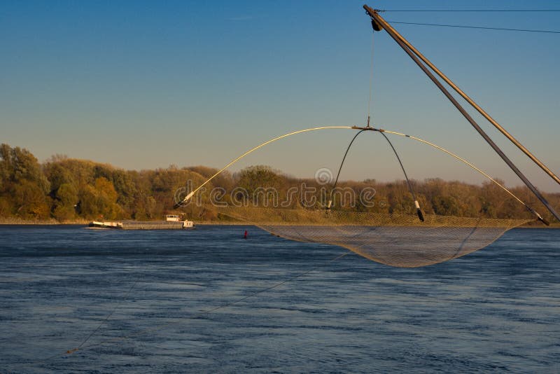 Fishing net by the river. stock photo. Image of ocean - 237440242