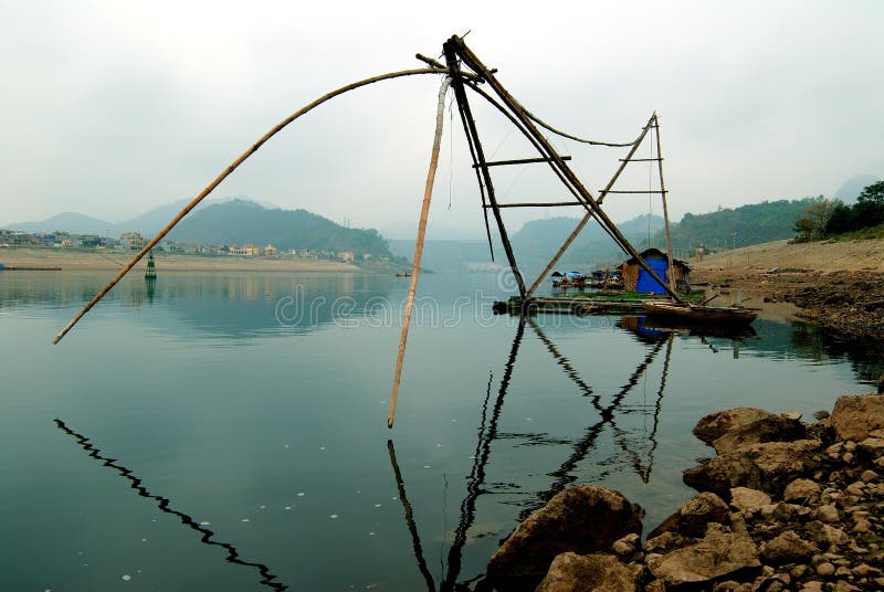 Fishing net on the river stock photo. Image of life - 154244126