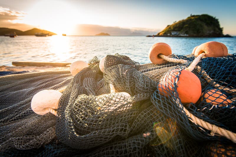 Fishing Net by Sunset at Beach Stock Image - Image of coast, nautical ...