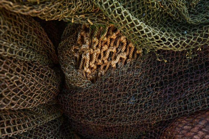 A Fishing Net is a Net Used for Fishing. Nets are Devices Made from ...