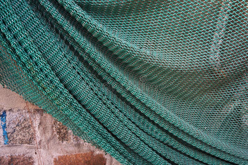 Fishing net on a wall. stock photo. Image of fisherman - 93167332