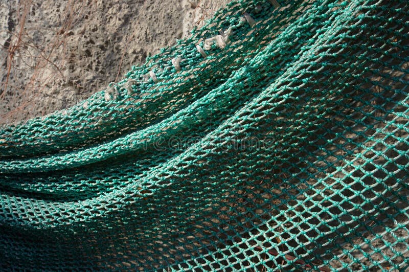 Fishing net on a wall. stock photo. Image of diagonal - 93445002