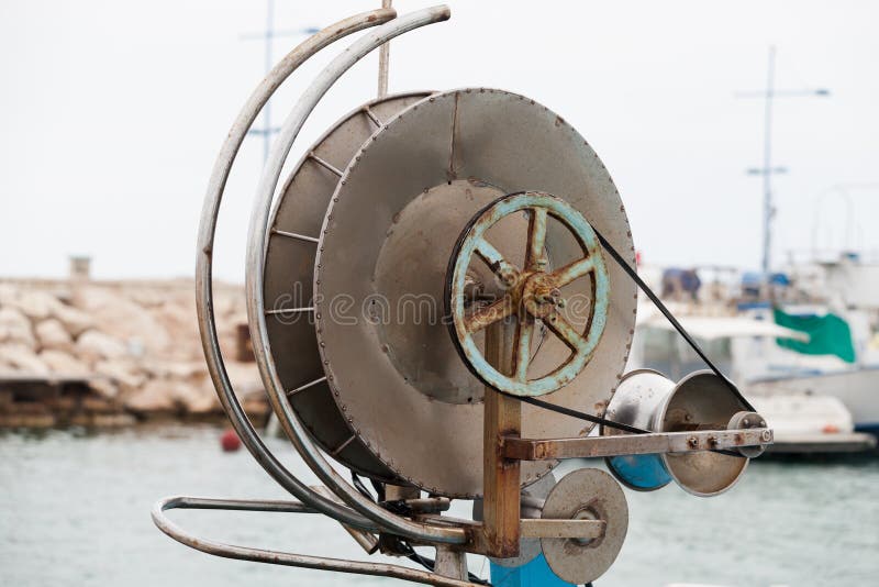 Fishing Net Winch a on Small Boat. Close-up Stock Photo - Image of ...