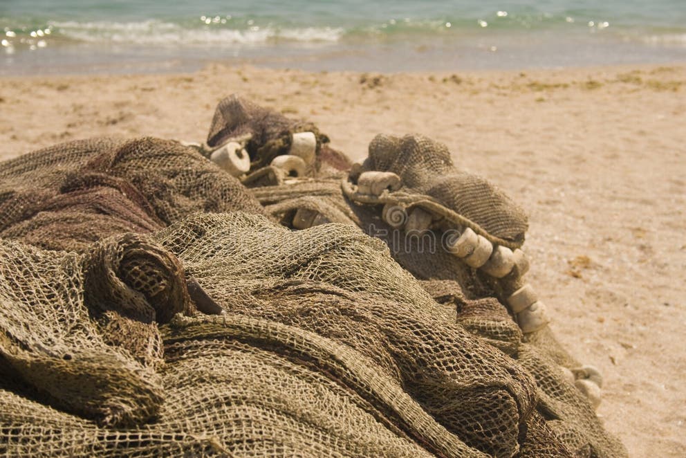 Fishing nets on beach stock photo. Image of beautiful - 5872036