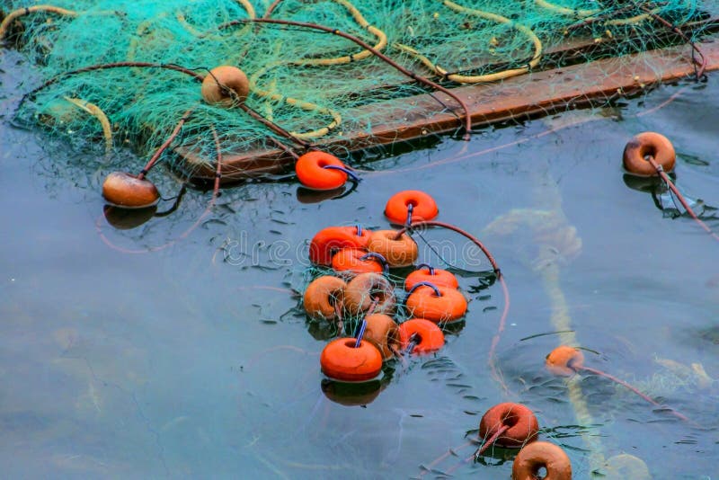 Fishing nets floating stock photo. Image of vacation - 111312962