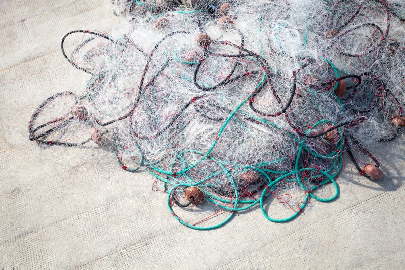 Fishing Nets Lay on Concrete Pier Stock Image - Image of knot ...
