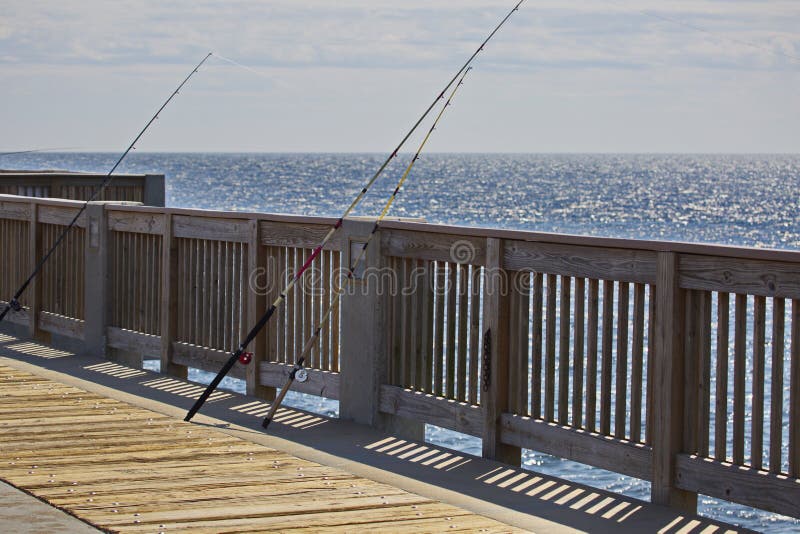 Fishing off the Pier stock image. Image of summer, ocean - 70735917