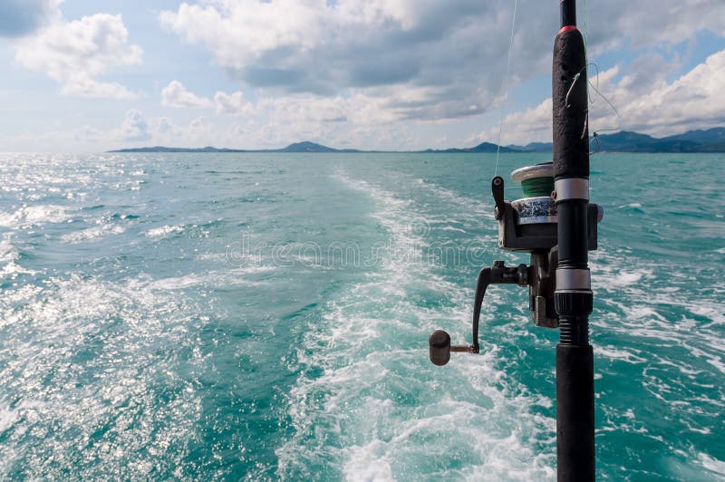 Angler Fisherman Fighting Big Fish Rod and Reel Stock Photo - Image of ...