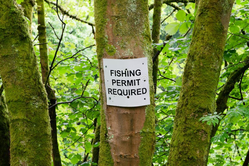 Fishing Permit Required Sign on Tree at Private River Stock Photo ...