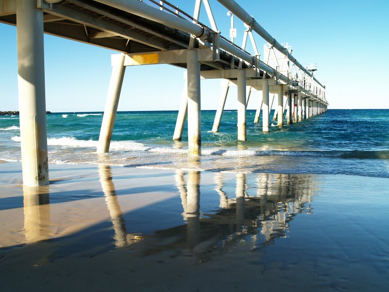 Fishing pier stock image. Image of water, reflection, landmark - 739869