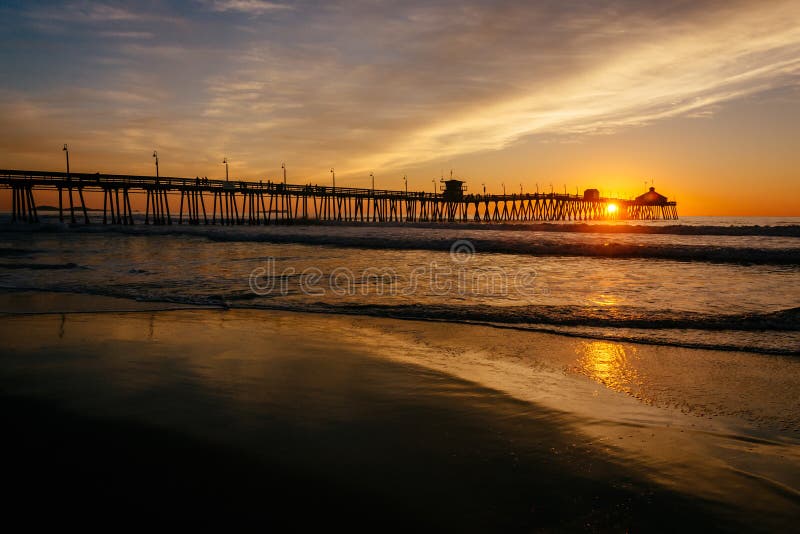 The fishing pier at sunset stock image. Image of blue - 50669617