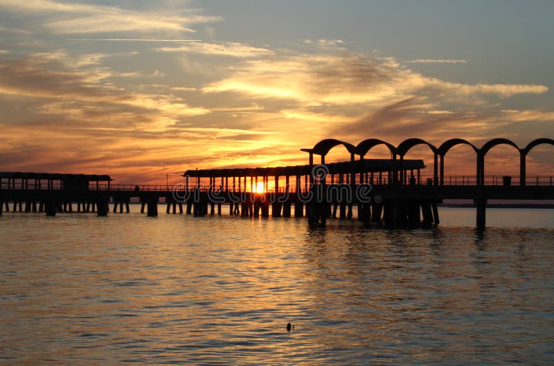 Fishing Pier at Sunset stock image. Image of architecture - 93908161