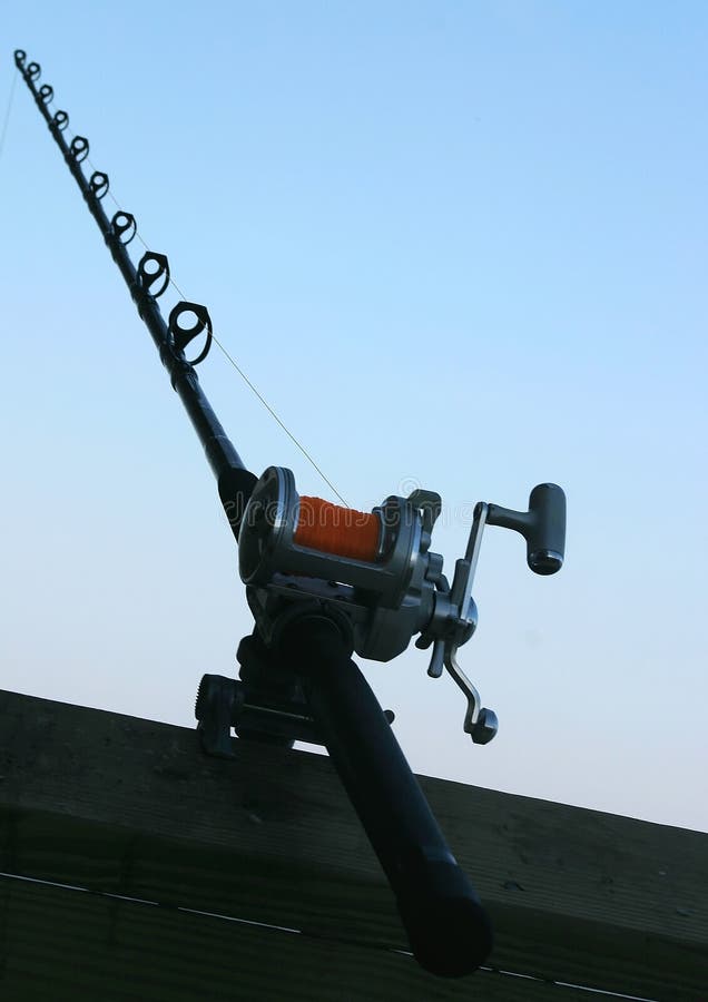 Vintage Fishing Rod and Reel Stock Photo - Image of pole, park: 14147076