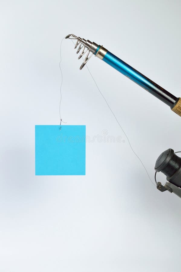 Fishing Pole With A Blank Blue Piece Of Paper Stock Image - Image of ...