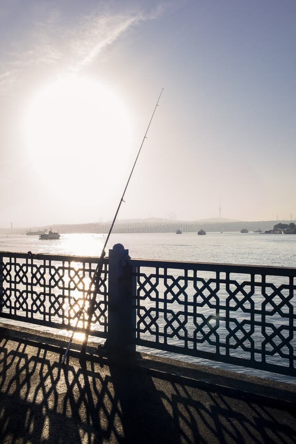 A Fishing Pole on the Galata Bridge in Istanbul Stock Image - Image of ...