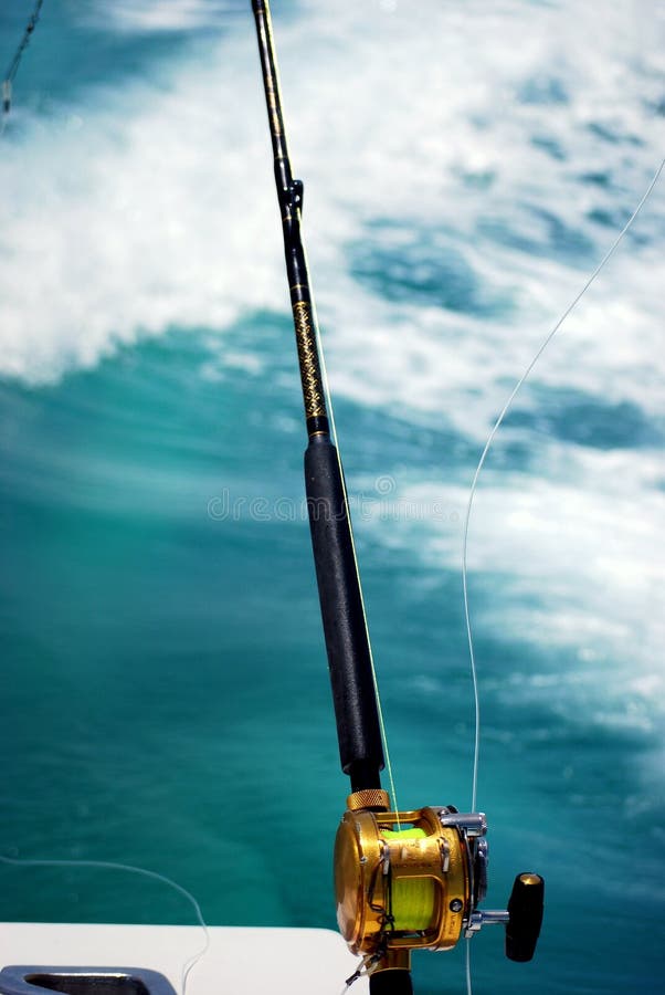 Fishing Pole Leaning Against Post Stock Photo - Image of white, fishing ...