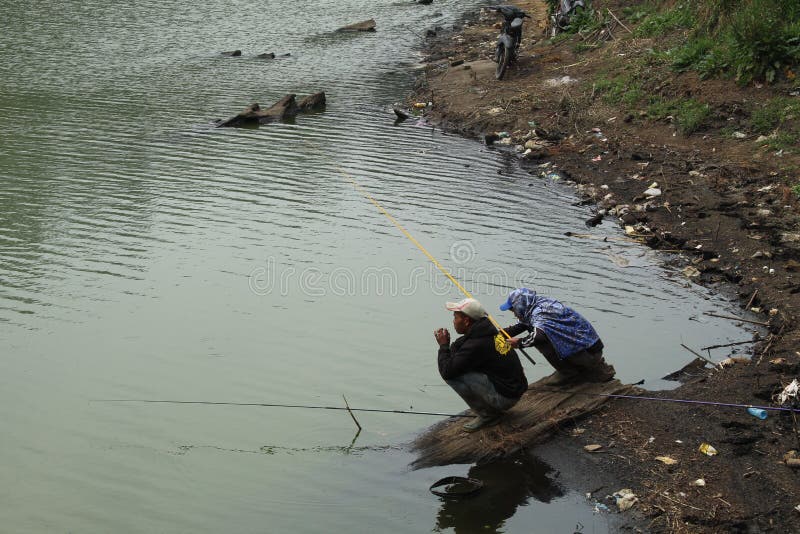 Fishing at Ranupane lake editorial image. Image of fishing - 162343765