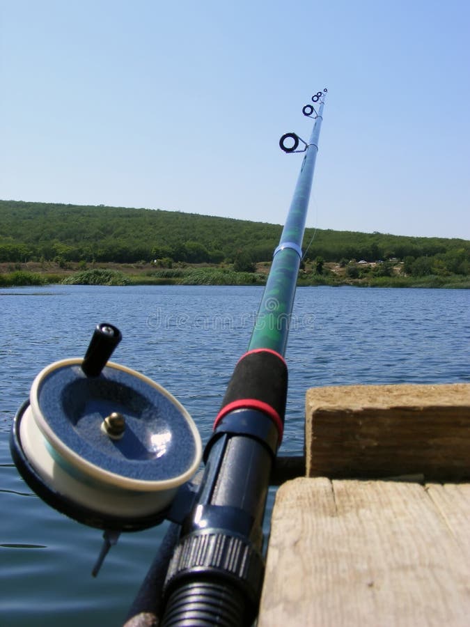Fishing rod stock photo. Image of river, angling, long - 20564726