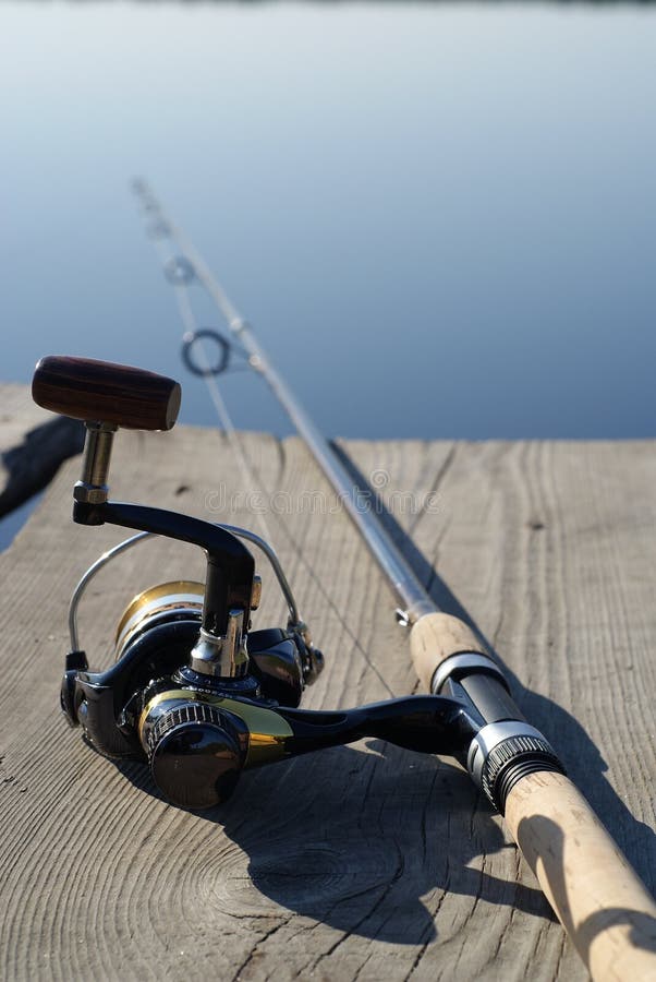 Fishing rod stock image. Image of lake, reel, wood, closeup - 20916545