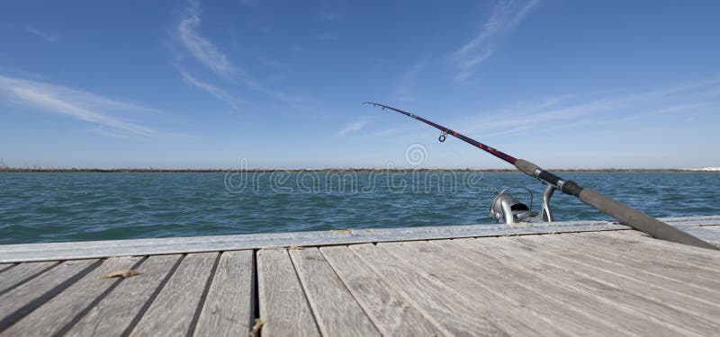 Fishing rod in dock stock photo. Image of outdoor, isolated - 23538458