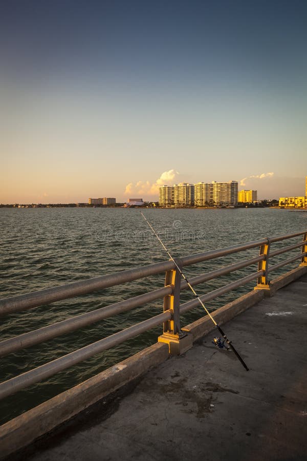 Fishing Rod & Pier at Sunset Stock Photo - Image of large, gulf: 25840968